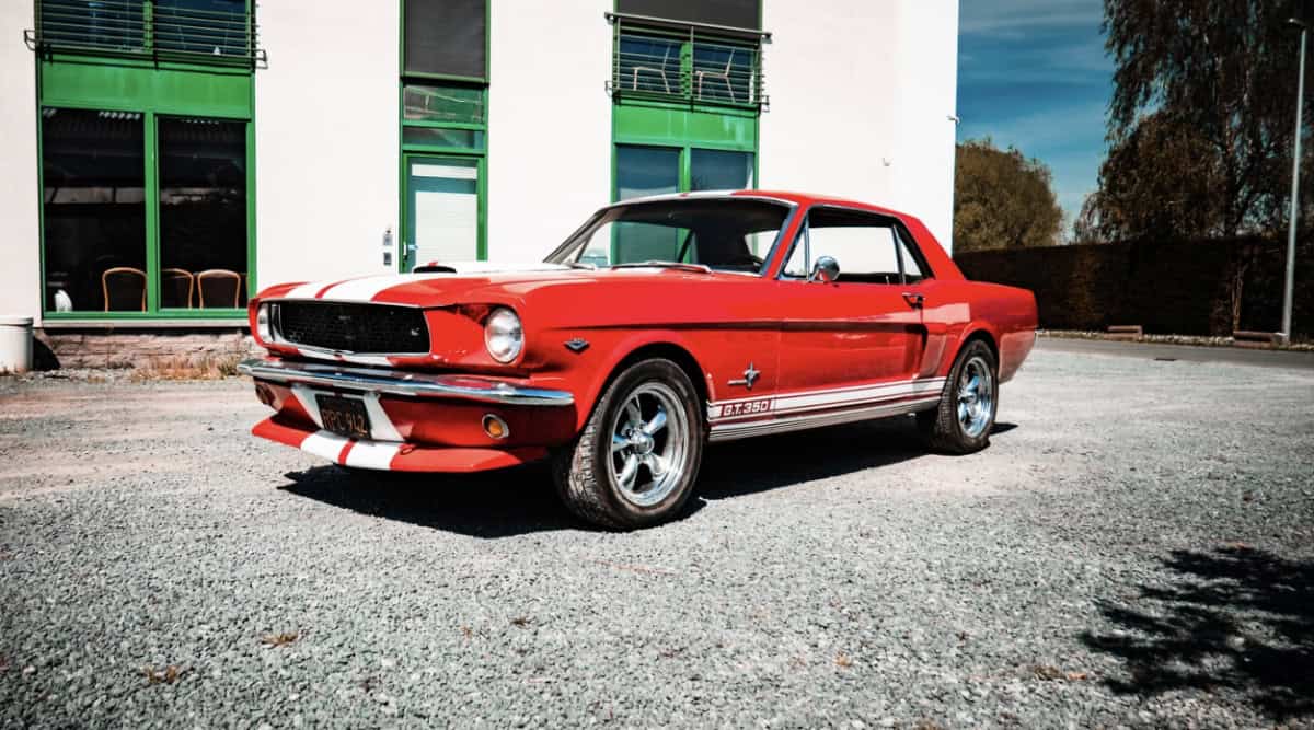 1966 Ford Mustang Fastback Red with White Stripes - Nostalgic Rides